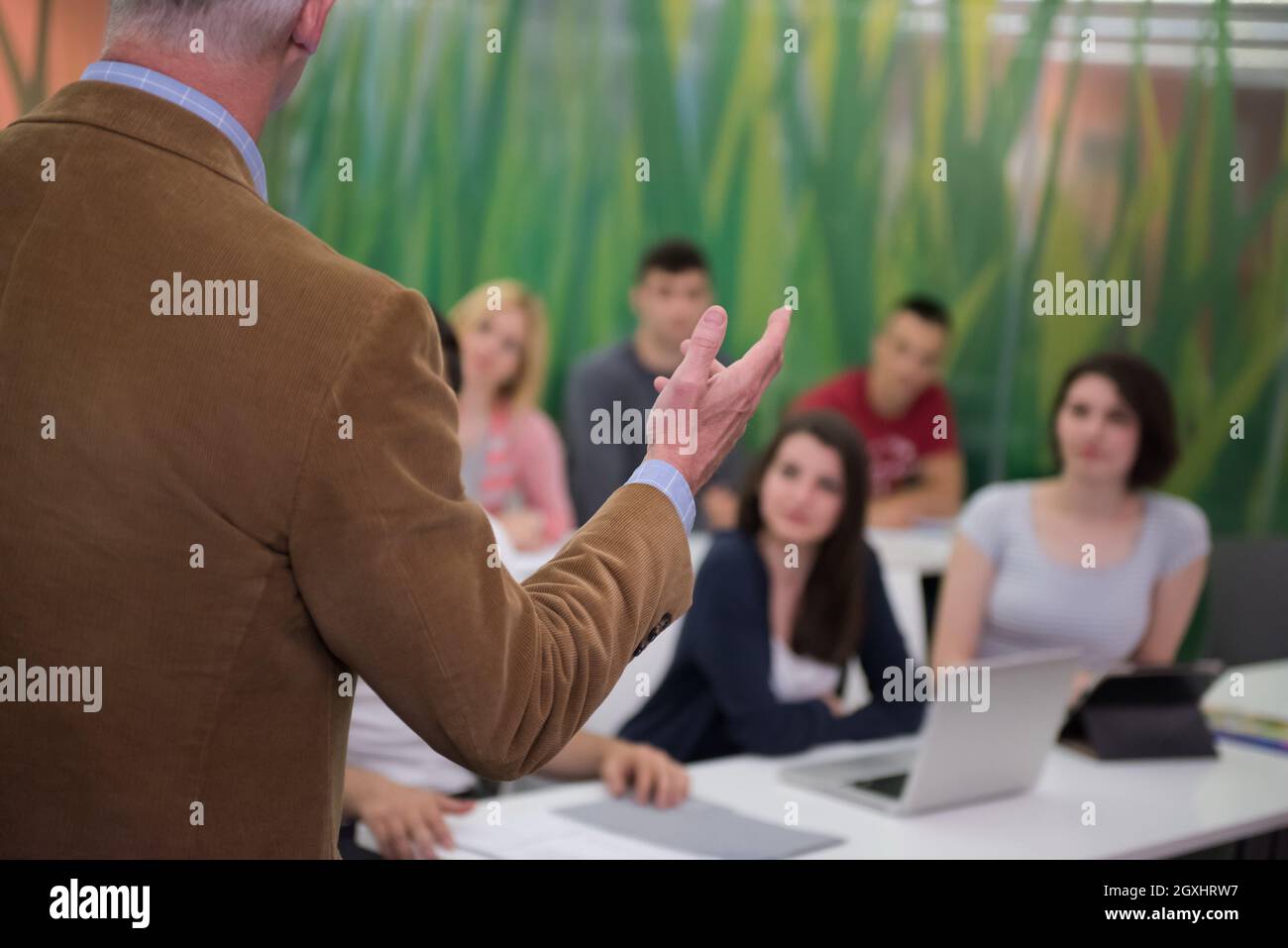 group of students study with professor in modern school classroom Stock ...