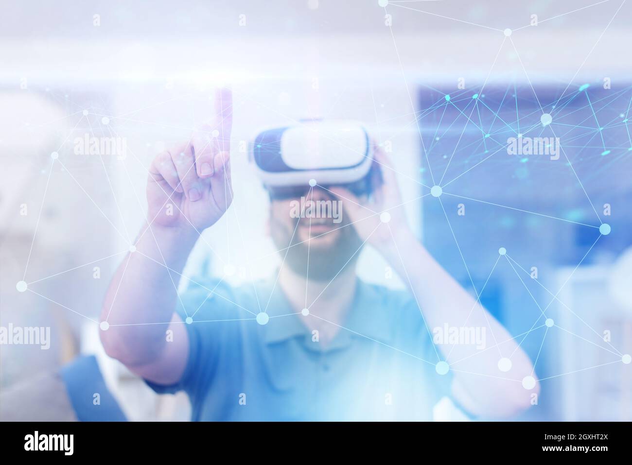 man trying virtual reality vr glasses at modern home with futuristic ...