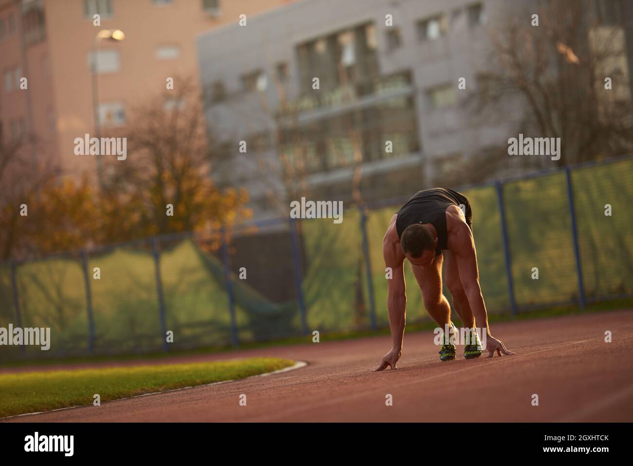 Athlete leaving starting blocks hi-res stock photography and images - Alamy