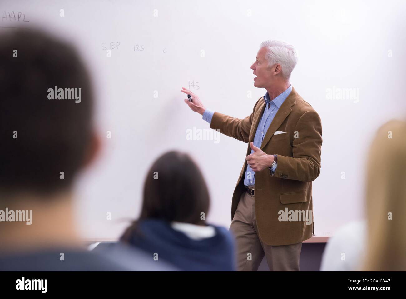 group of students study with professor in modern school classroom Stock ...
