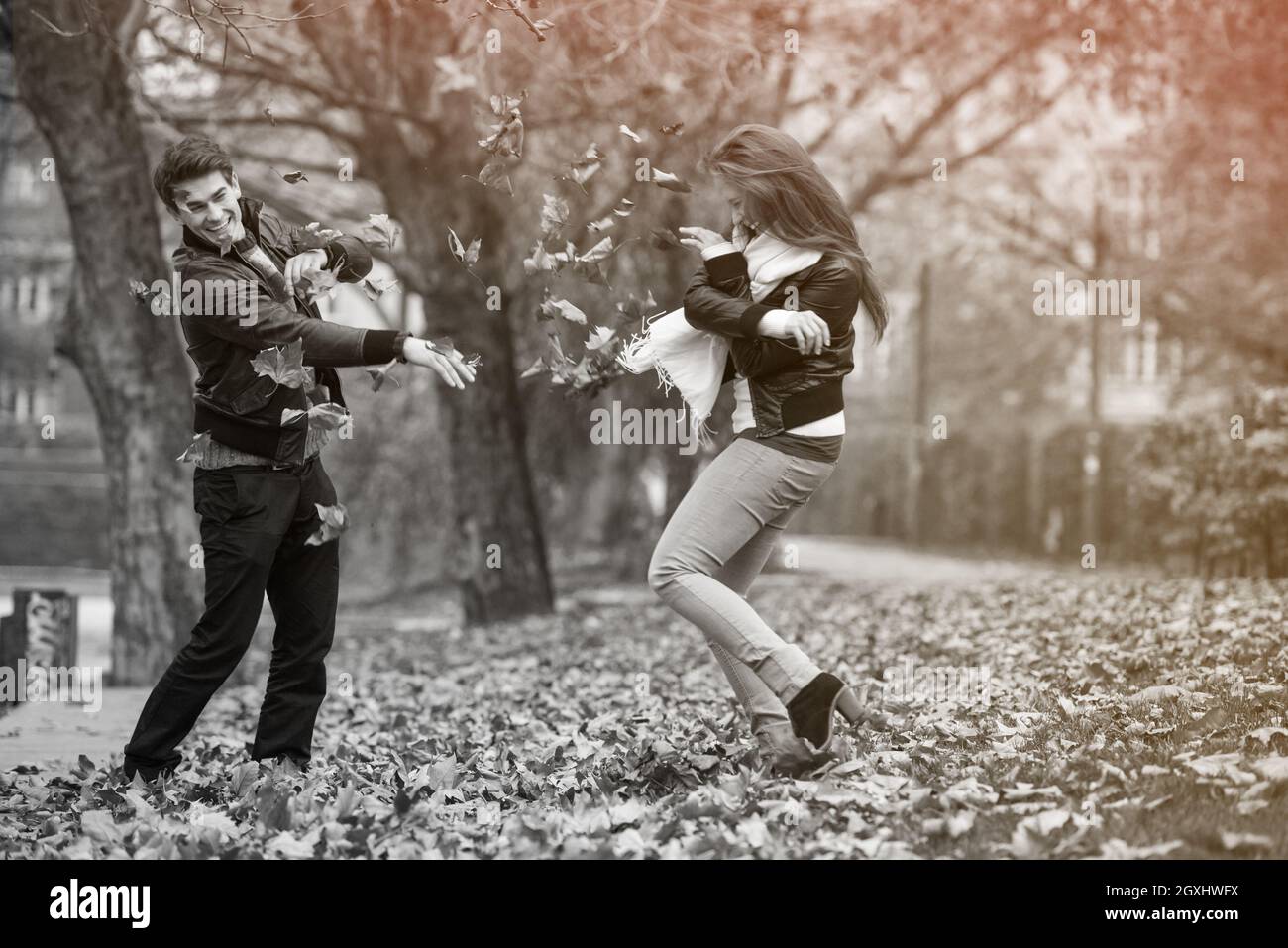 Happy young Couple in Autumn Park. Fall. Yellow Trees and Leaves ...