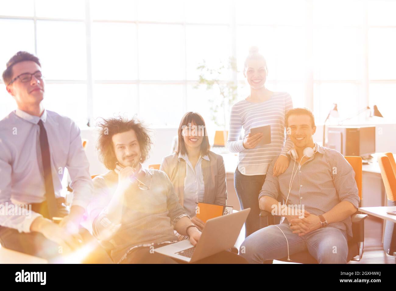 Group of successfull business group meeting in the at work with sun ...
