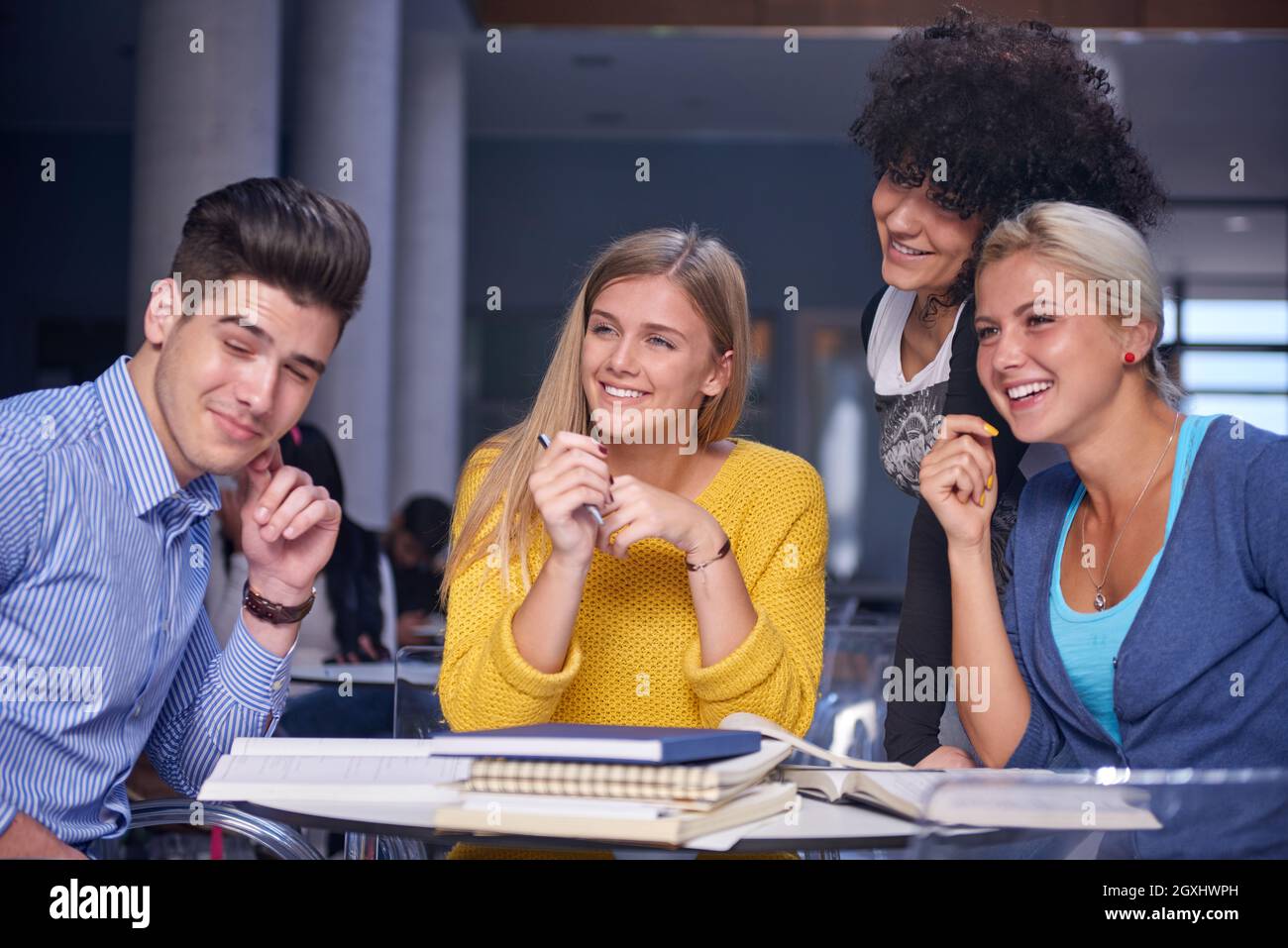 happy students group study in classroom Stock Photo - Alamy