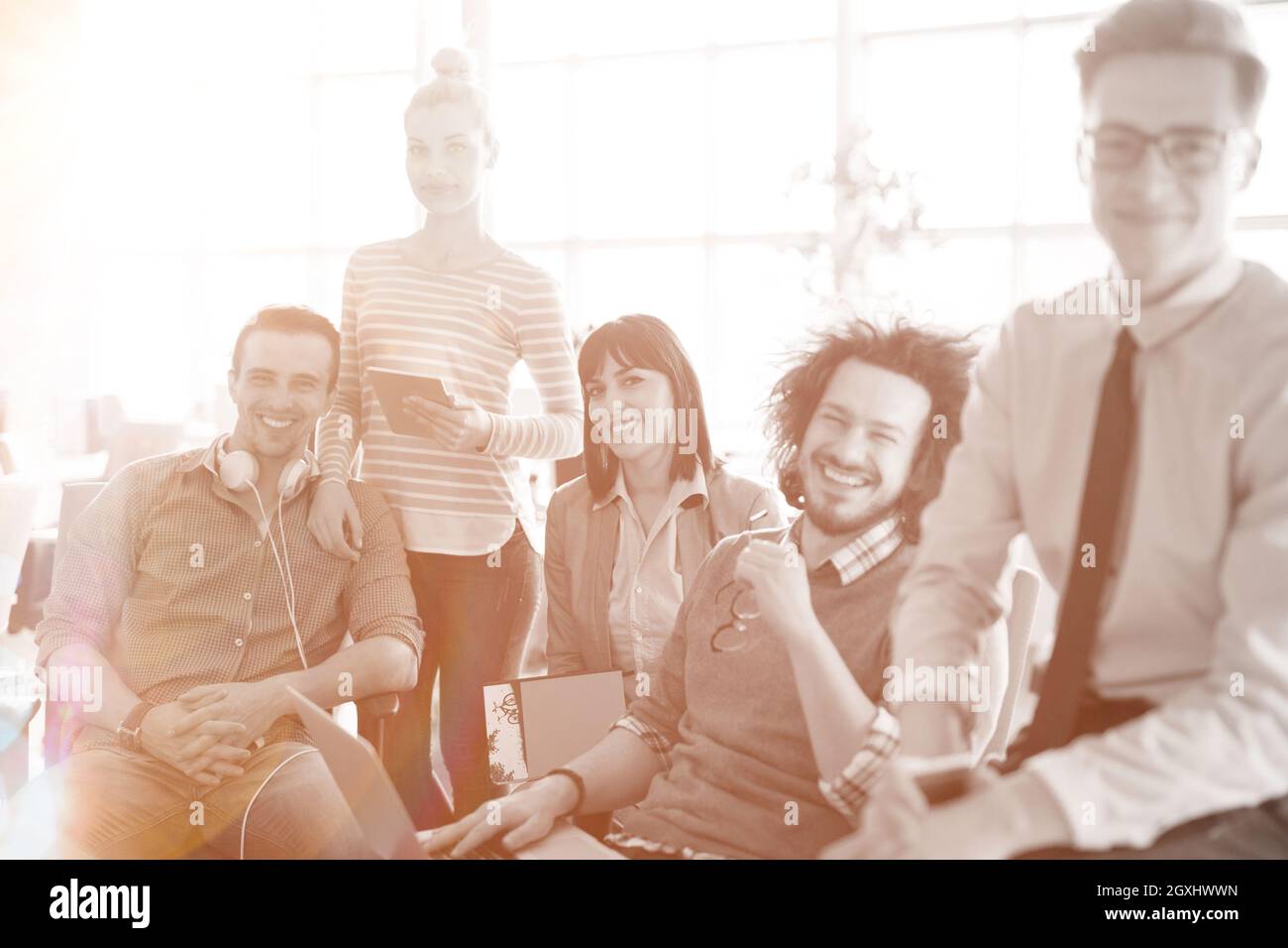 Group of successfull business group meeting in the at work with sun ...