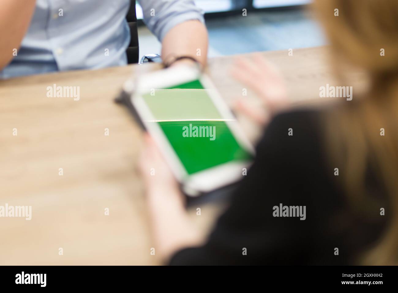 Businesswoman using tablet at the work in office Stock Photo - Alamy
