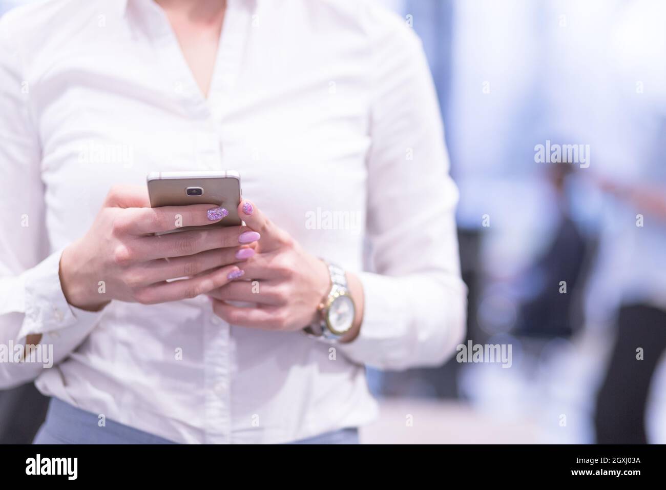 female manager using cell telephone in startup office interior Stock ...
