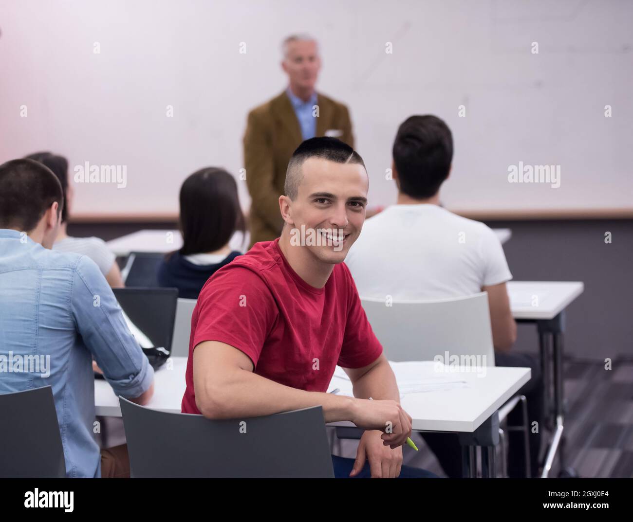 technology students group in computer lab school classroom working on ...