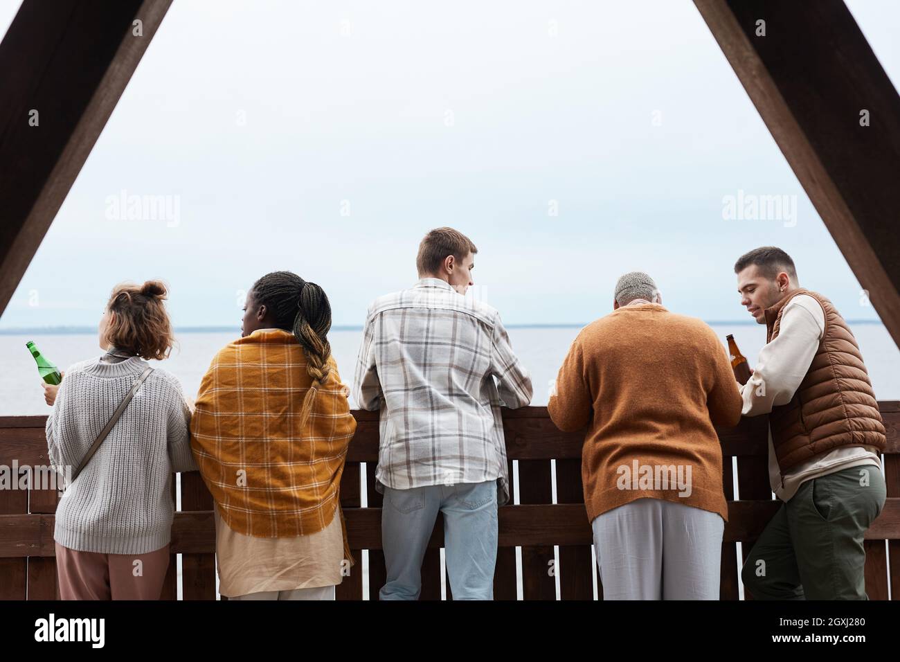 Group people relaxing on balcony hi-res stock photography and images ...
