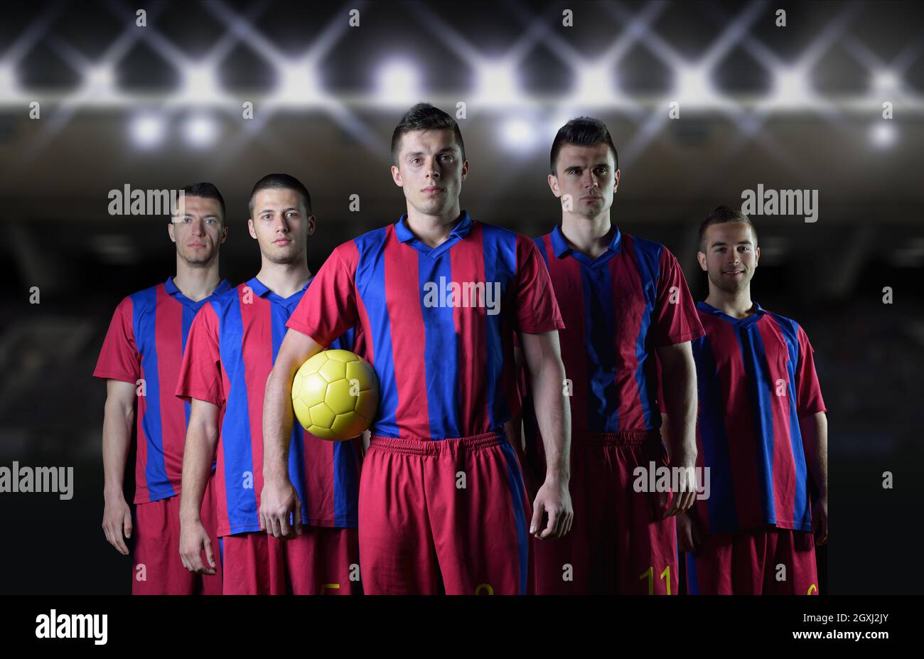 soccer players team group isolated on a stadium Stock Photo - Alamy