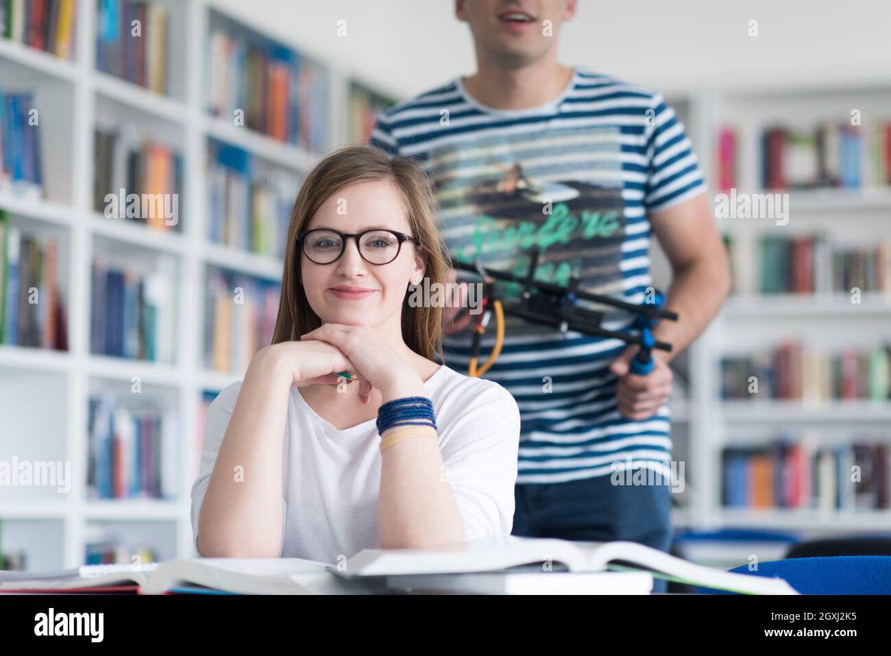 female student study in school library, using laptop and searching for ...