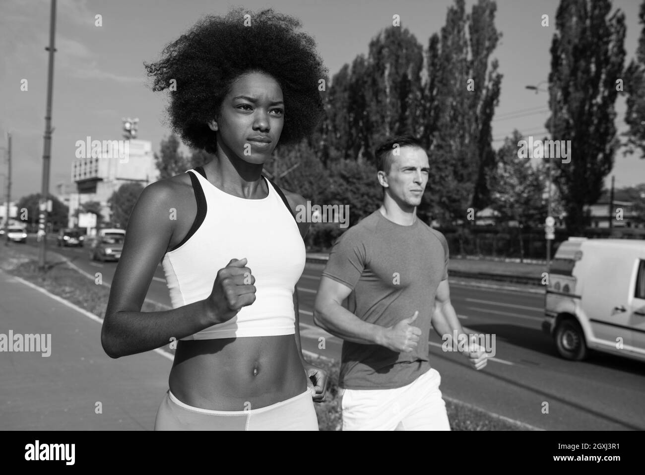 Female running legs marathon Black and White Stock Photos & Images - Alamy