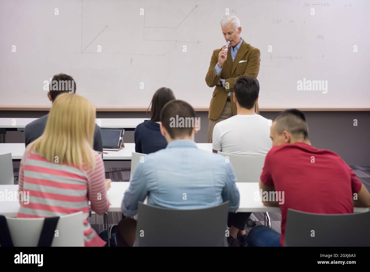 group of students study with professor in modern school classroom Stock ...