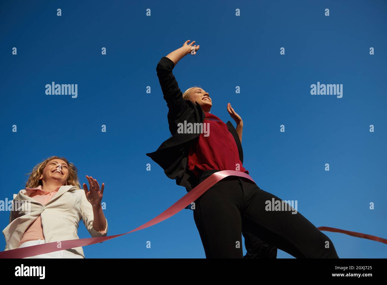 business people running together on racing track Stock Photo - Alamy