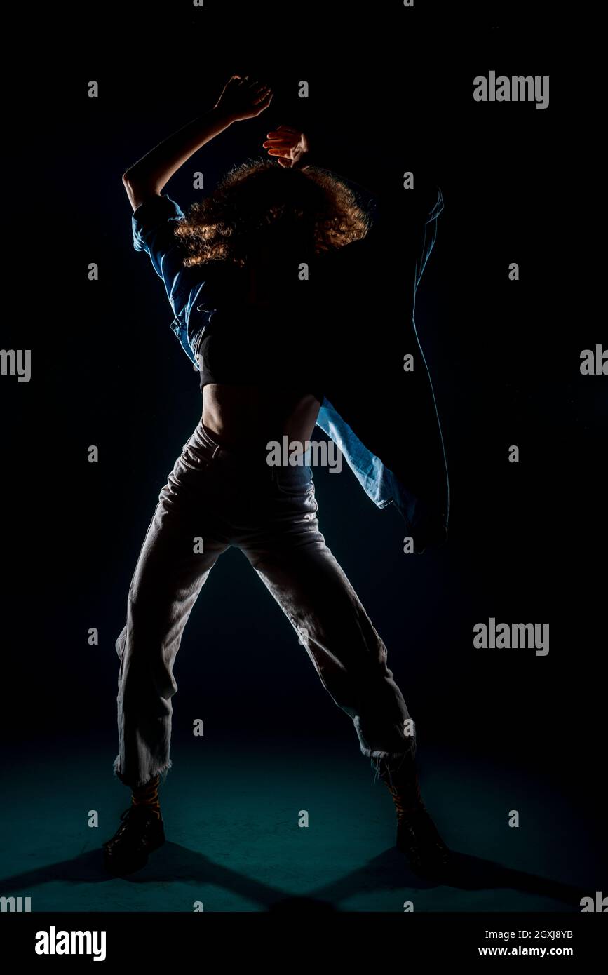 Dance moves performed by an acrobatic flexible female dancer Stock ...