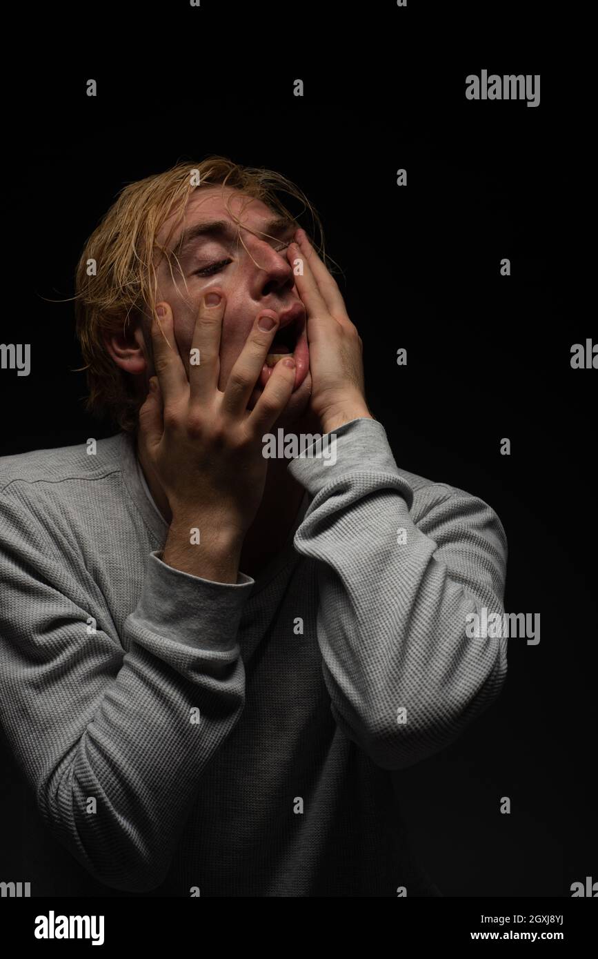 Perfect portrait of broken boy suffering while hurting himself Stock ...