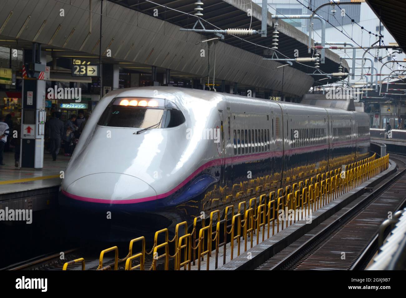 Rapid train Shinkansen arrives in a station, Okayama, Japan Stock Photo ...