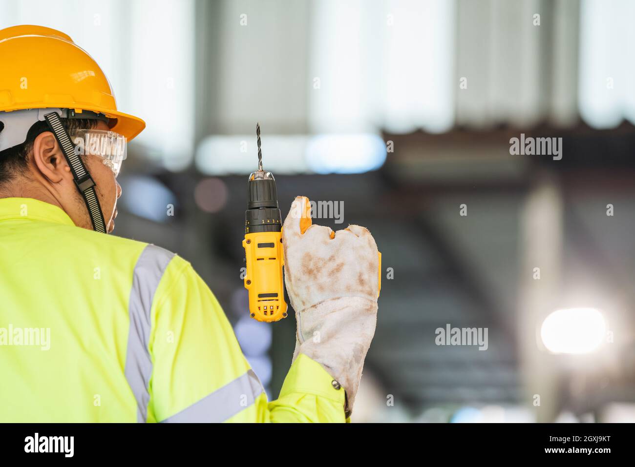 Man holding in production facility hi-res stock photography and images ...