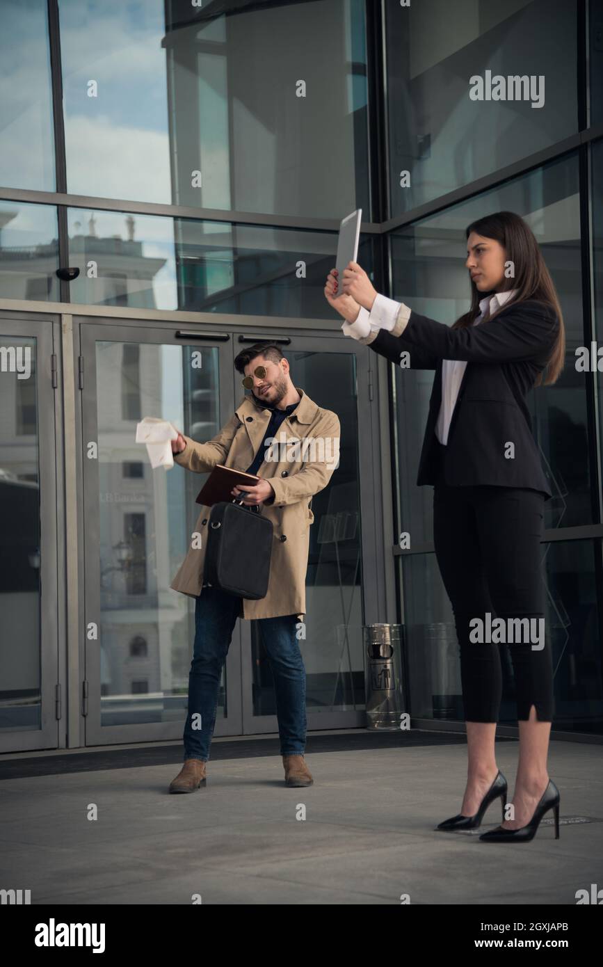Female boss is waiting for her assistent to finish his call Stock Photo ...
