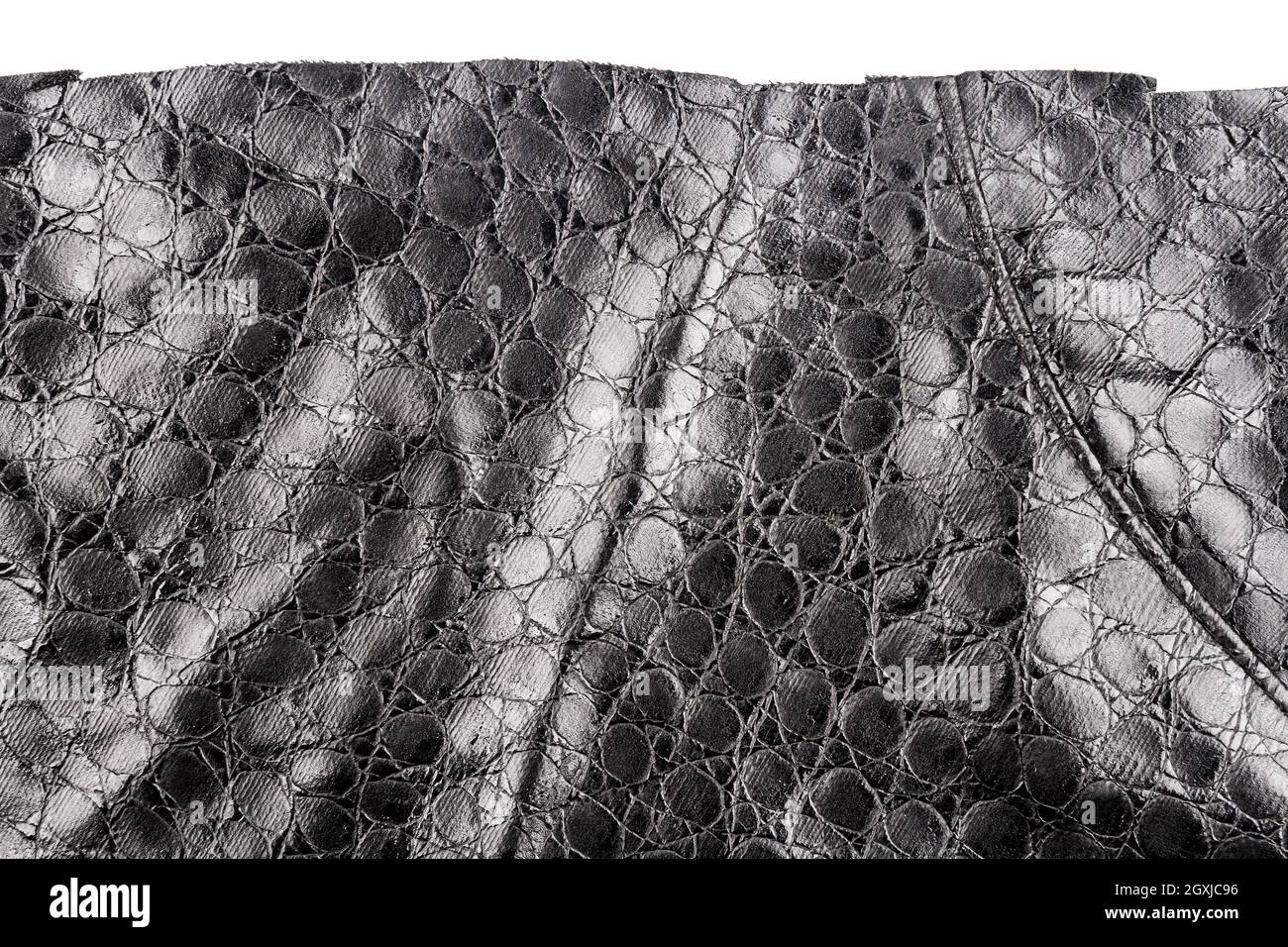Piece of black artificial leather isolated on white background. Fake ...