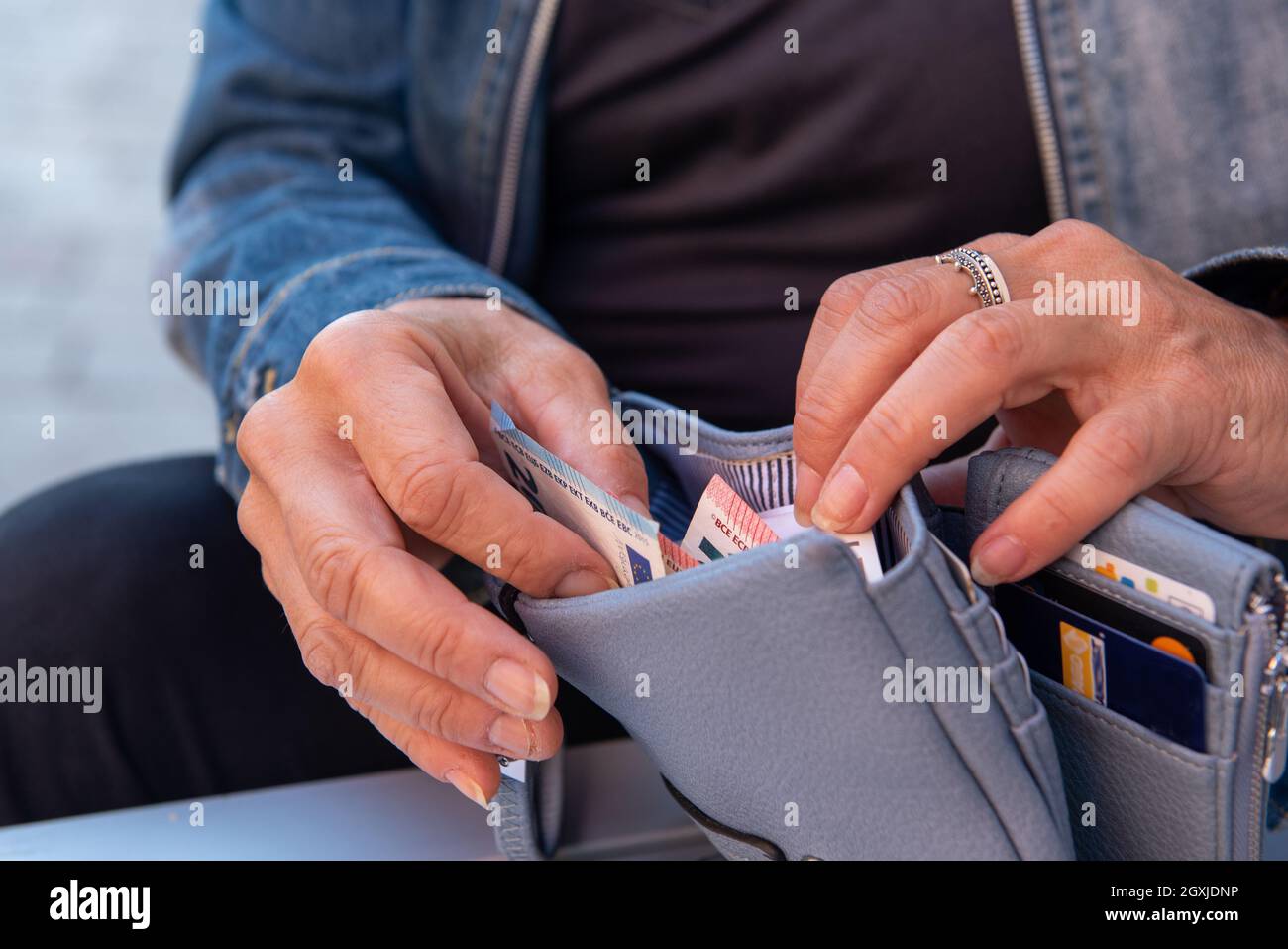 Female hand taking a bank card from a purse hi-res stock photography ...