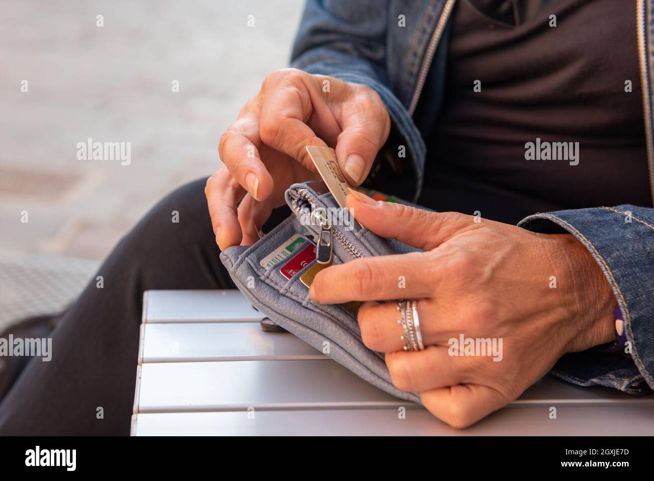 Woman taking dollar banknote hi-res stock photography and images - Alamy
