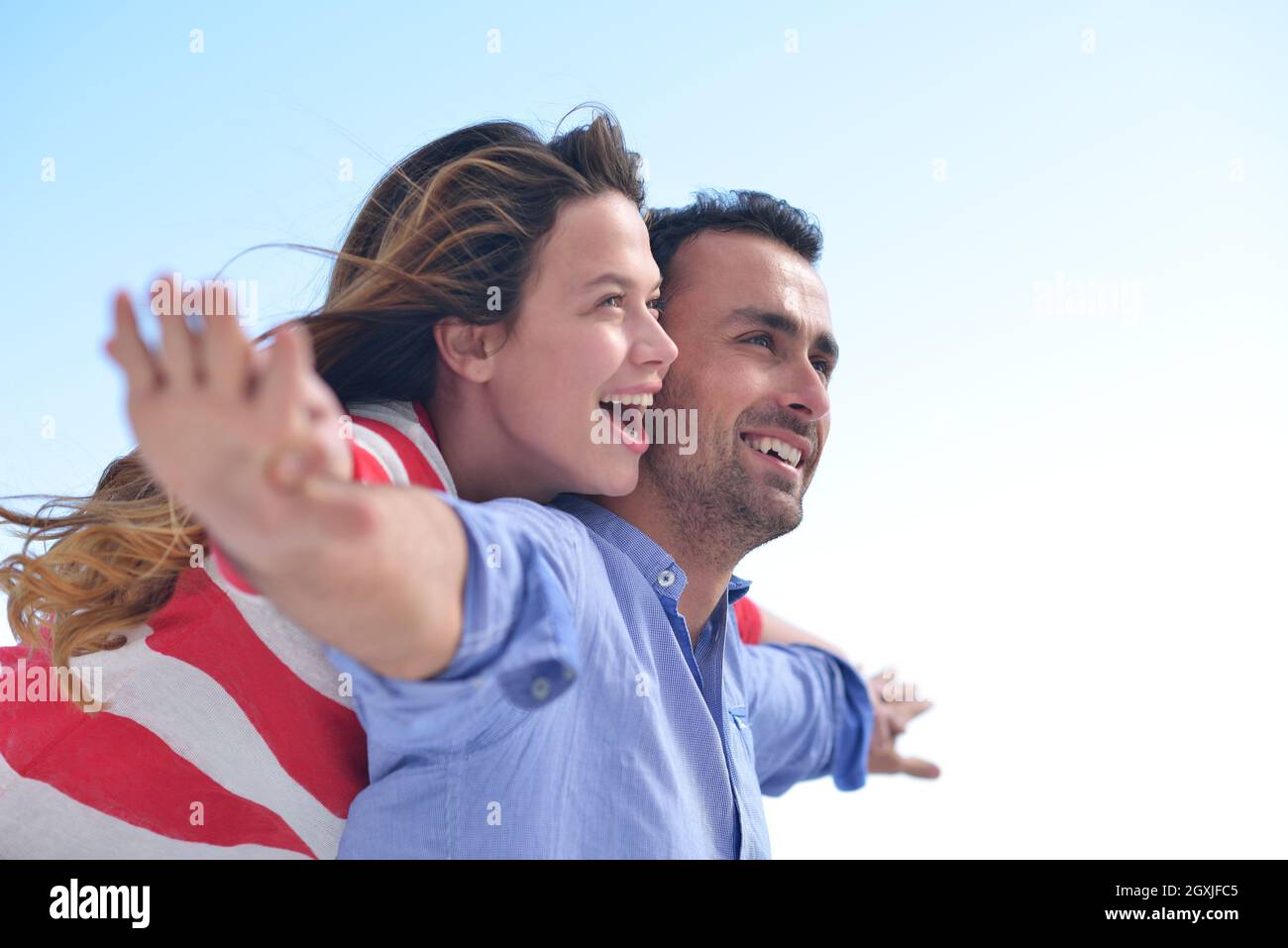 happy young romantic couple have fun relax smile at modern home indoor ...