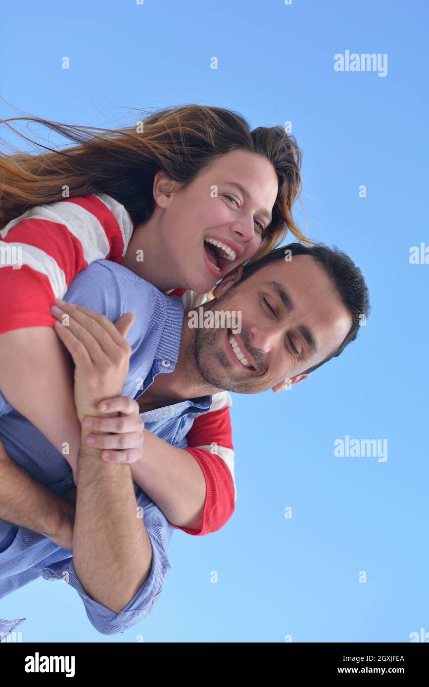 happy young romantic couple have fun relax smile at modern home indoor ...