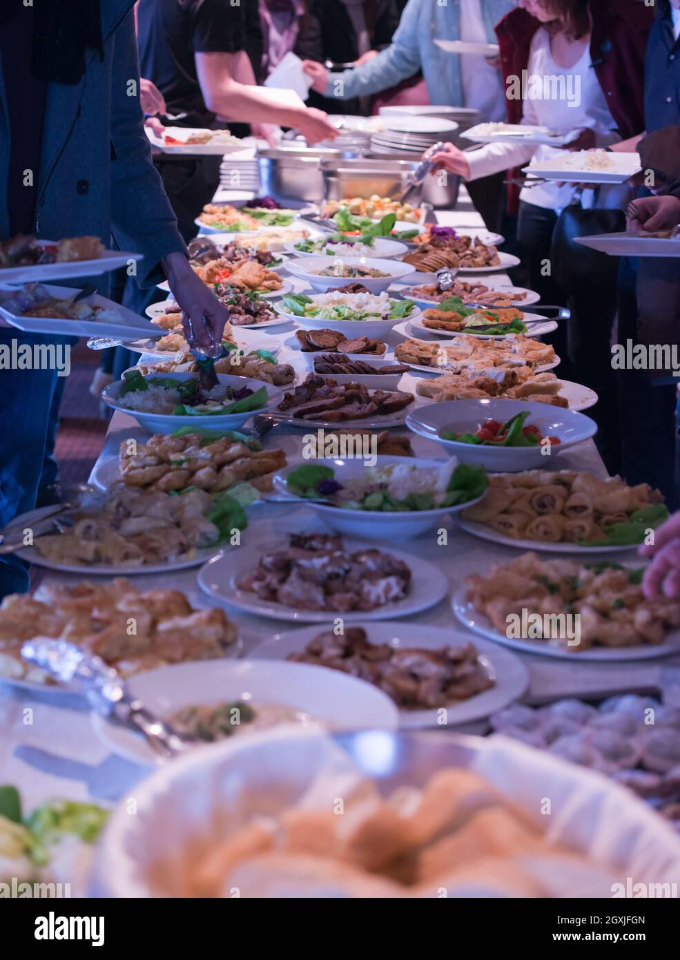 people group catering buffet food indoor in school restaurant with meat ...