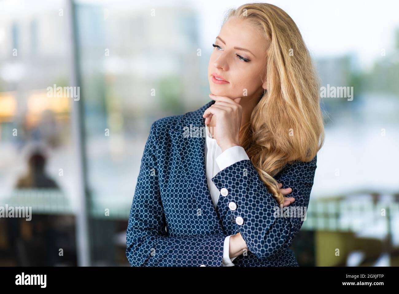 Confident young female manager outdoor in a modern urban setting Stock ...