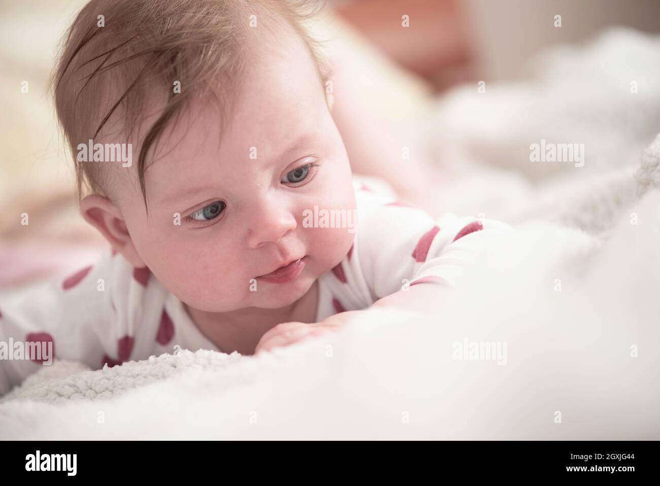 cute little baby playing with hand and smiling with no teeth funny ...