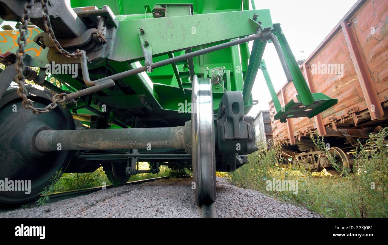 View underneath wagon on cargo train car on industrial railroad Stock ...