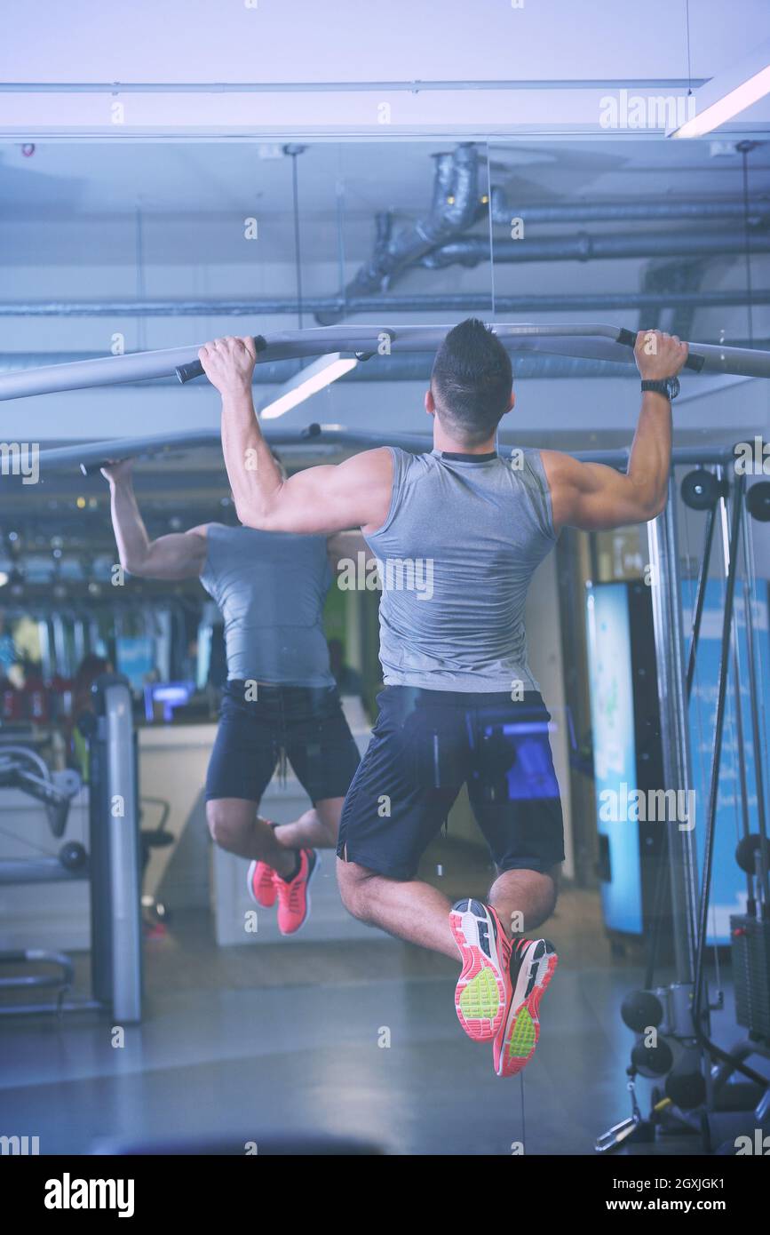 Strong handsome man exercising hi-res stock photography and images - Alamy