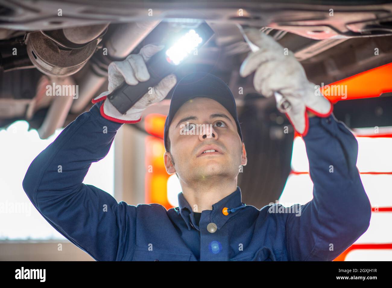 Inspecting parts hi-res stock photography and images - Alamy