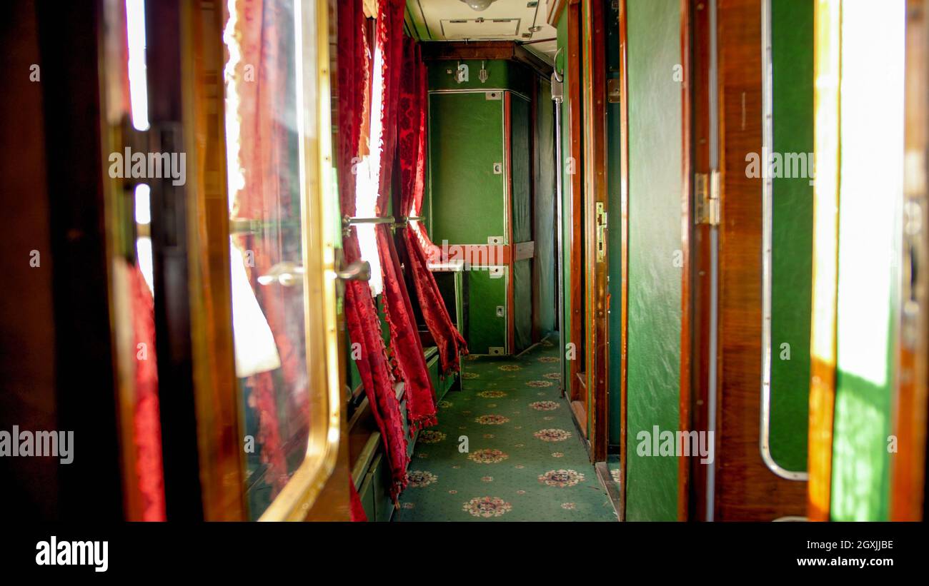Vintage express train with carpet and wooden doors Stock Photo - Alamy