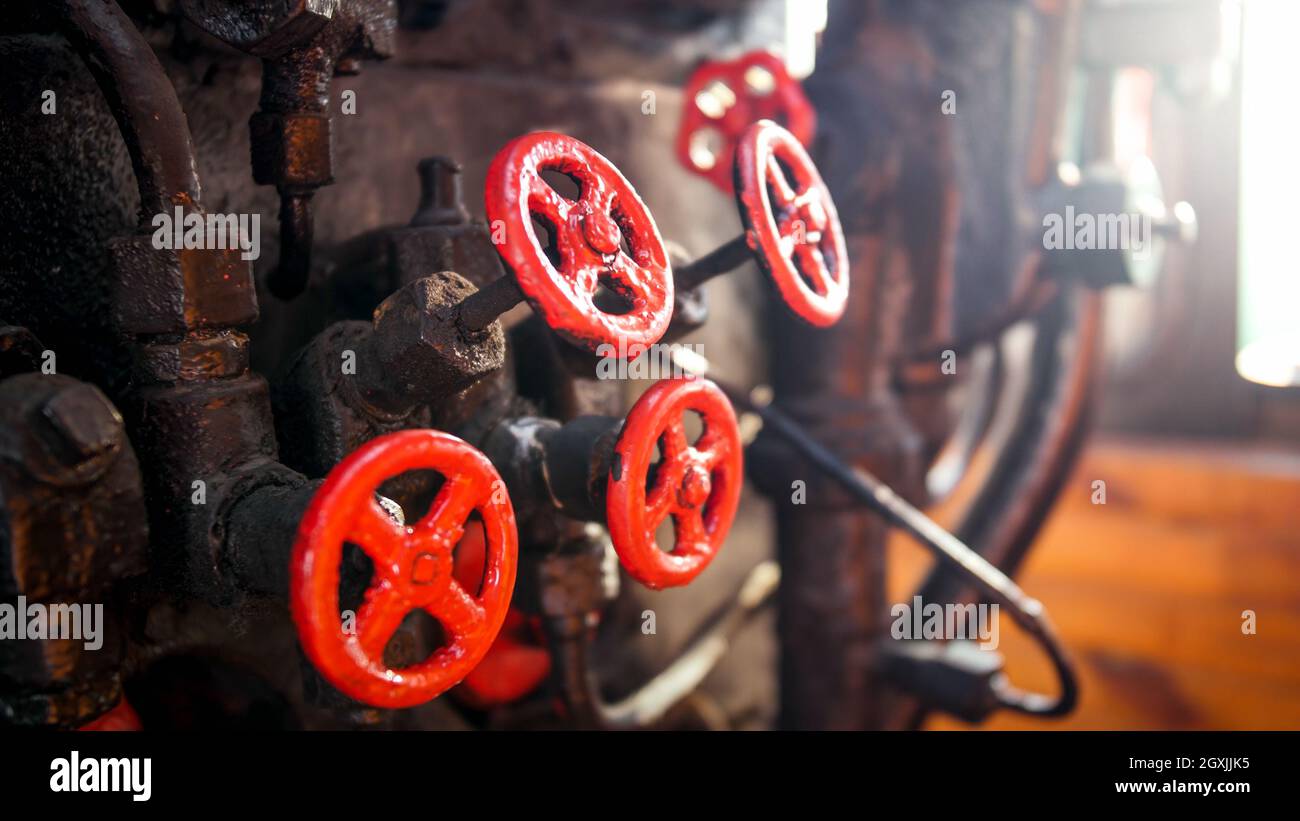 Brass steam engine valves hi-res stock photography and images - Alamy