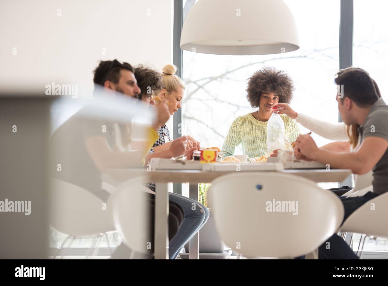Smiling women drinking soda together hi-res stock photography and ...