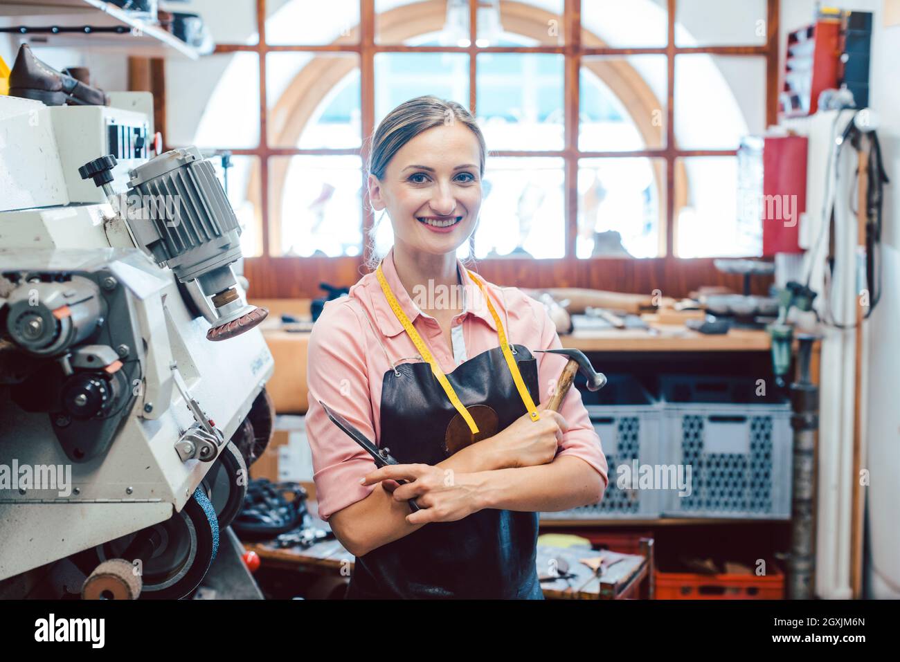 Business portrait of proud owner in her small cobbler workshop Stock ...