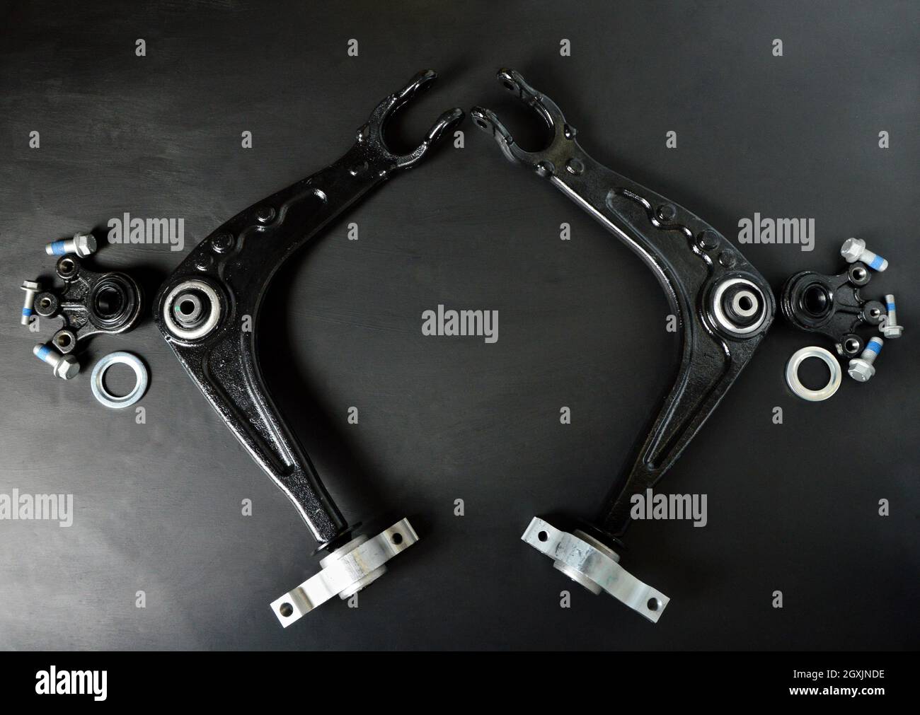 Auto parts to replace the suspension triangle of a car Stock Photo - Alamy