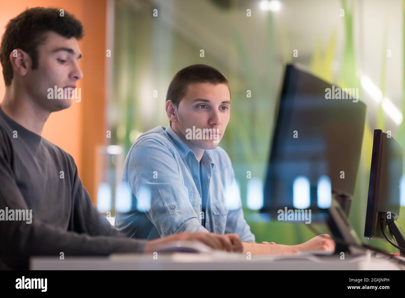 technology students group in computer lab school classroom working on ...