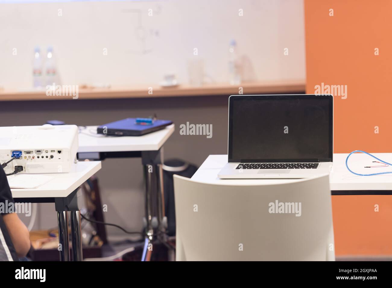 empty it classroom with program code on projector screen and modern ...