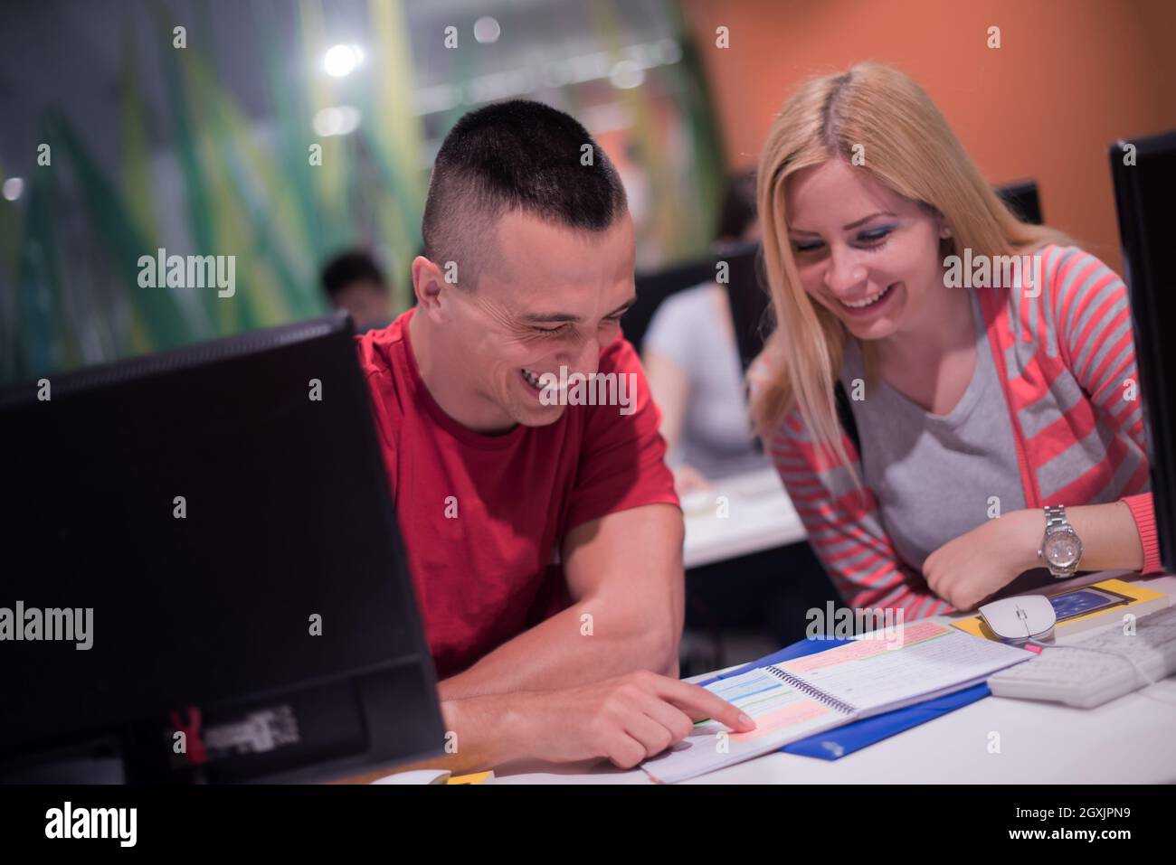 technology students group in computer lab school classroom working on ...