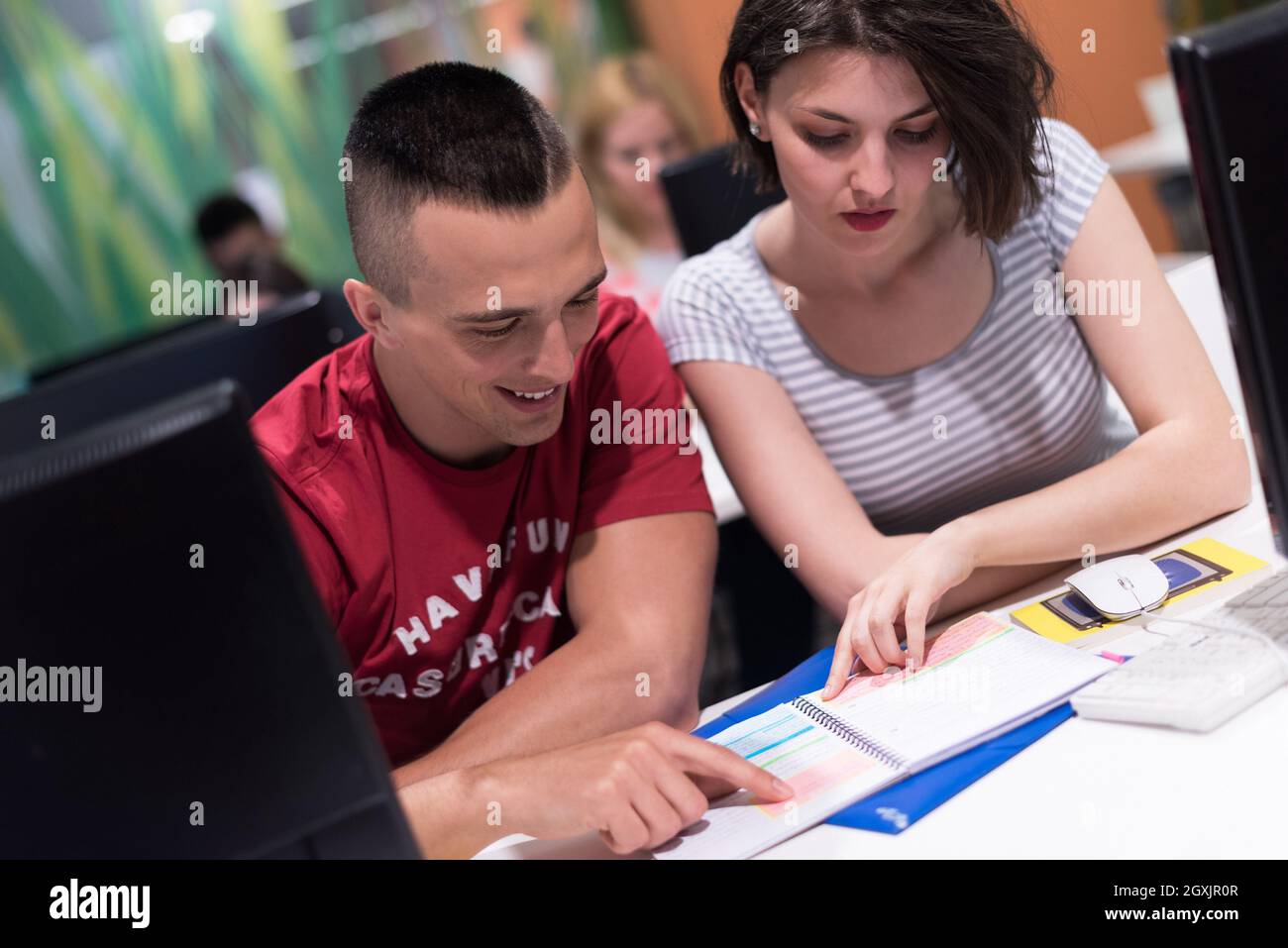technology students group in computer lab school classroom working on ...