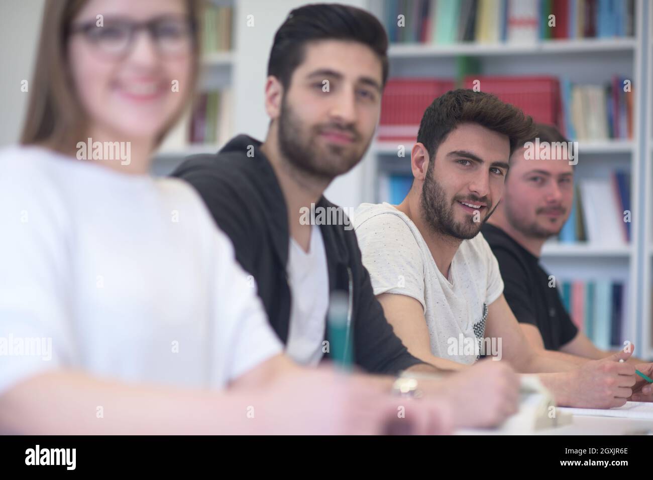 students group study together in school classroom and working together ...