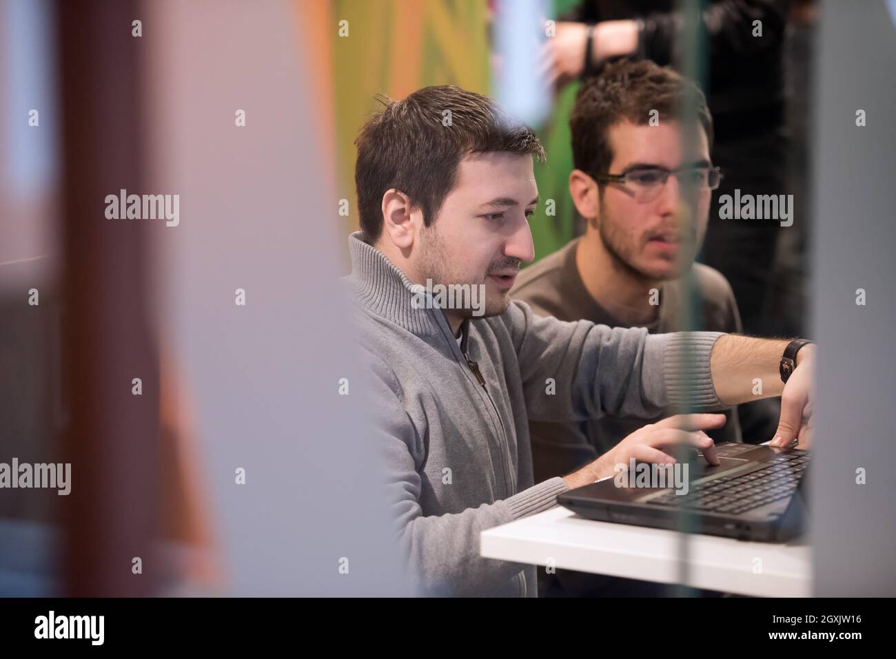 young computer technology students on code programming class have ...