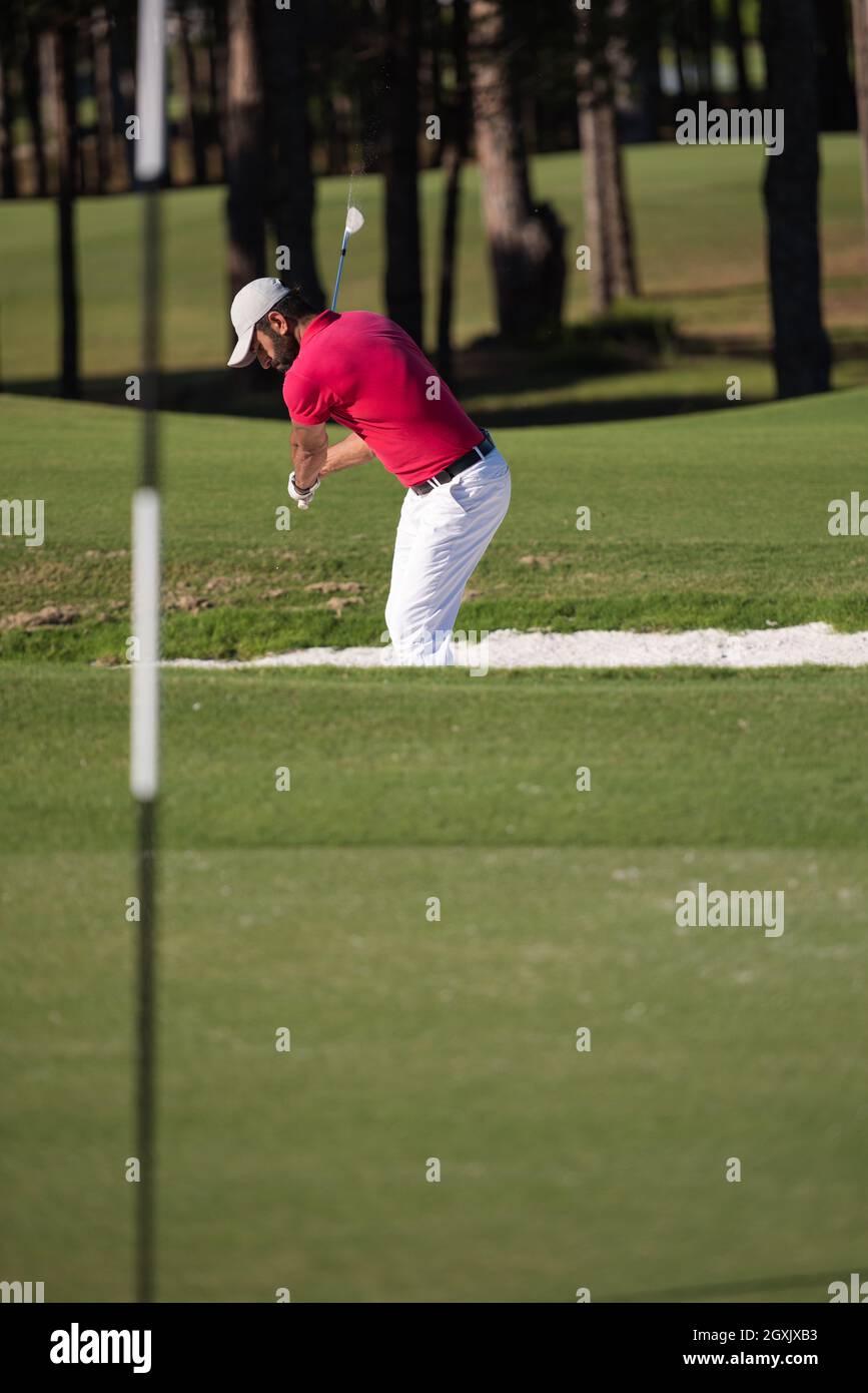 golf player shot ball from sand bunker at course Stock Photo - Alamy