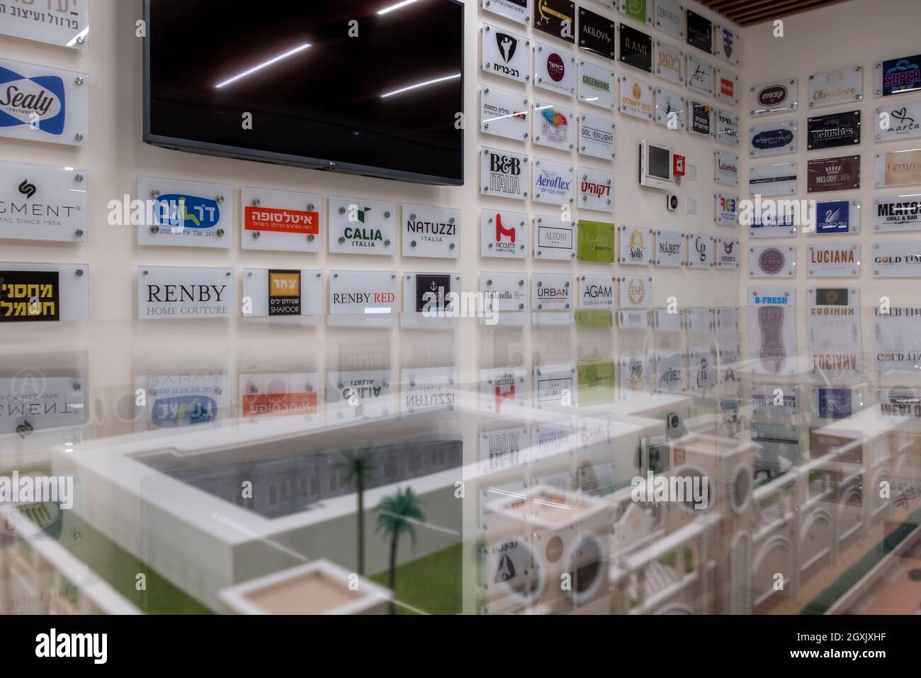 A wall bearing logos of Israeli and some international companies which ...
