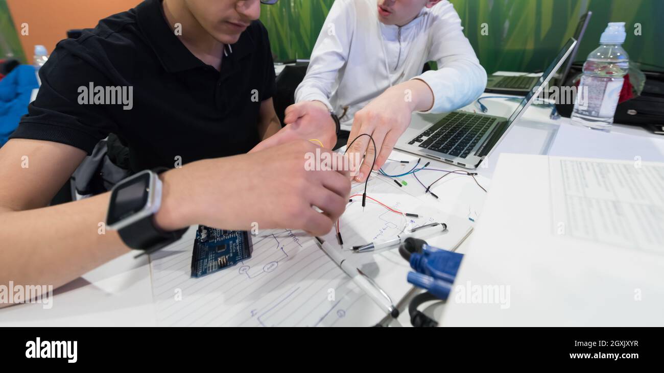 it students in computer science classroom working together on project ...