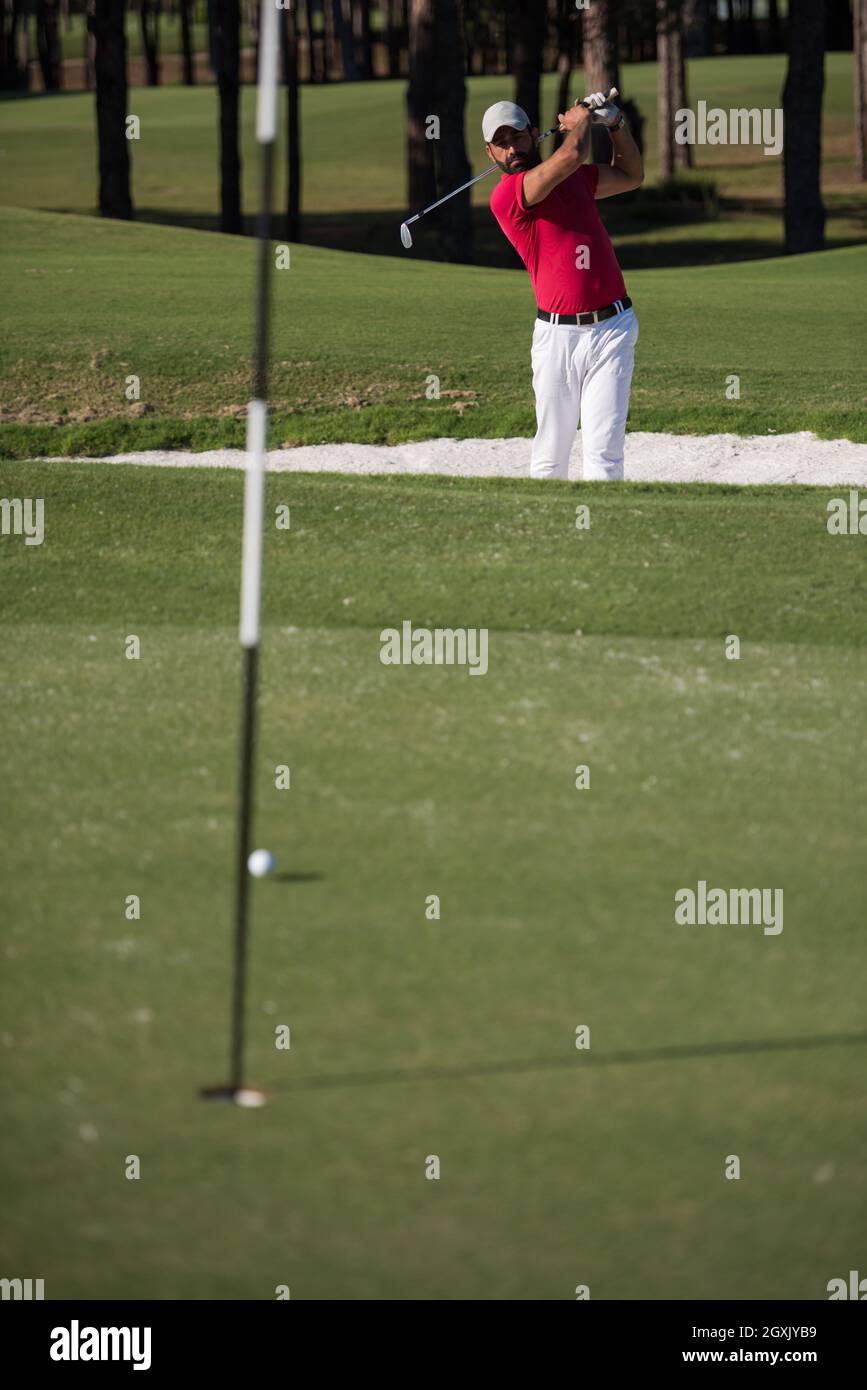 golf player shot ball from sand bunker at course Stock Photo - Alamy