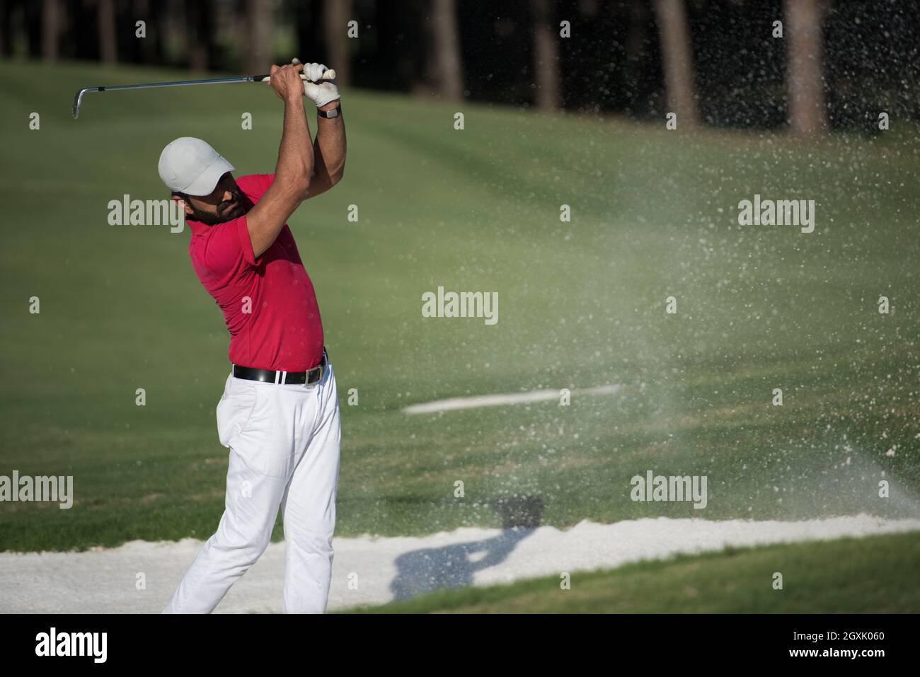 golf player shot ball from sand bunker at course Stock Photo - Alamy