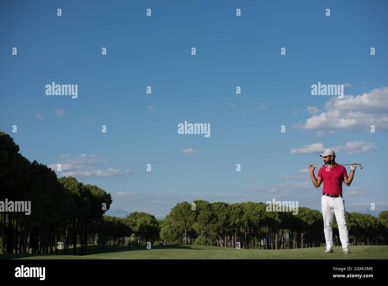 handsome middle eastern golf player portrait at course at sunny day ...
